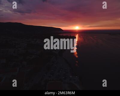 sunset above lefkada town Stock Photo - Alamy