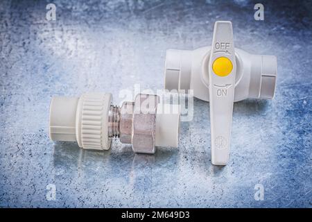 Water valve threaded pipe connectors on metallic background ...
