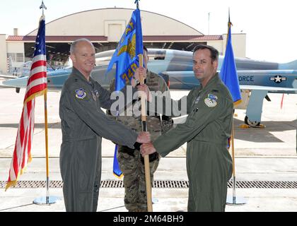 Col. Kyle Goldstein, 340th Flying Training Group commander, presents ...