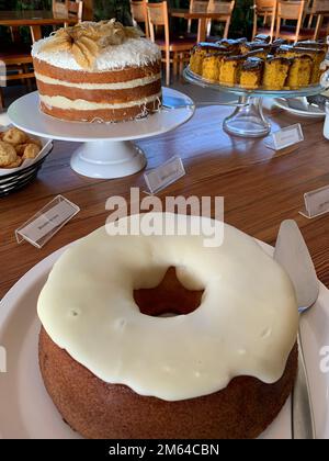 Carrot cake with icing layered Stock Photo - Alamy