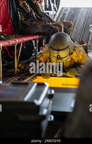 A CH-47 Chinook crew chief looks over the landscape on Camp Humphreys ...