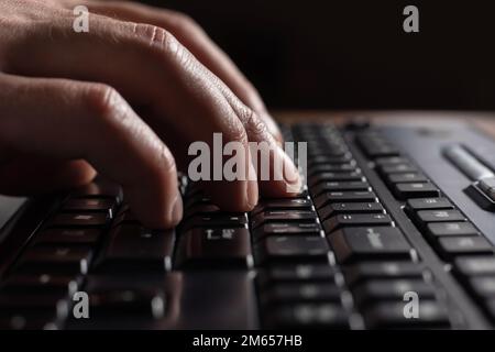 Hands on keyboard. Chatting friend, search information form internet ...