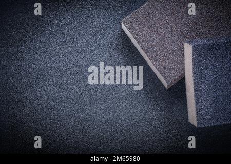 Abrasive sponges on emery paper vertical view Stock Photo - Alamy