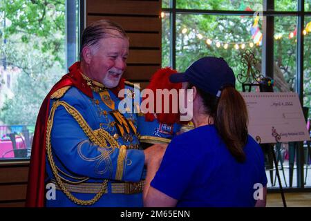 Barton Simpson, King Antonio of the Texas Cavaliers, waves to attendees ...