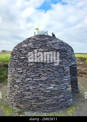 A beehive hut in Ireland at Fahan on the Dingle Peninsula, County Kerry ...