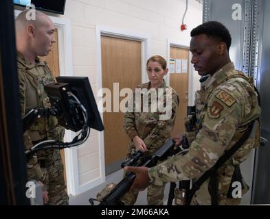 Col. Lisa Wildman, 501st Combat Support Wing vice commander, center ...