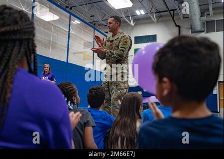 Col. Joseph Kramer, 7th Bomb Wing commander, poses with Hailey Barton ...