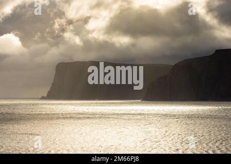 Beautiful sun beams over the North Cape cliff and the Arctic Ocean ...