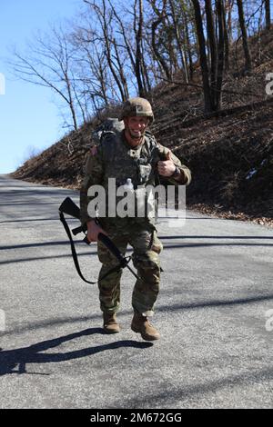 "A soldier from Battery C, 121st Field Artillery, 2nd Corps School ...