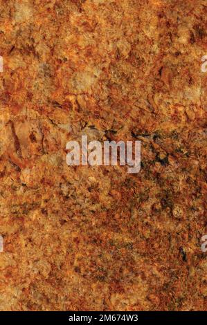 Raw pegmatite feldspar igneous rock terracotta pattern, rusty orange ...