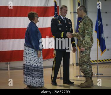 Alaska Army National Guard Brig. Gen.Charles Lee Knowles, bows his head ...