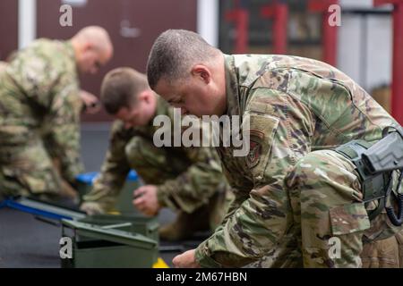 Col. Patrick Launey, 374th Mission Support Group commander, awards Lt ...