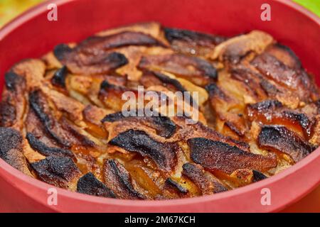Pear pie in silicone mold after baking in the oven Stock Photo - Alamy