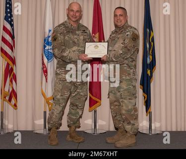 Col. Jon Brierton (center), commander of U.S. Army Support Activity ...