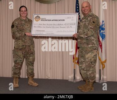 Col. Jon Brierton (center), commander of U.S. Army Support Activity ...