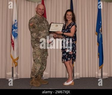 Col. Jon Brierton (center), commander of U.S. Army Support Activity ...