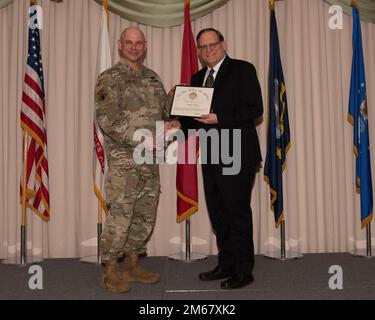 Col. Jon Brierton (center), commander of U.S. Army Support Activity ...