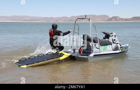 A specially built AlumaPro Rescue Watercraft is shown wearing U.S ...