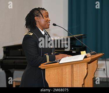 Chaplain (1st Lt.) Ruth A. Gakunga prays to God during a Passing of ...
