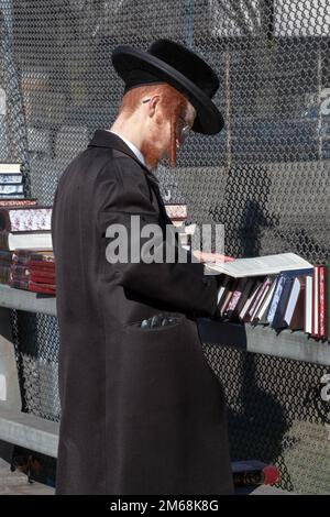 Hasidic Jew with long hair and beard, dressed in hat and typical attire ...