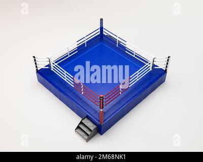 A modern regulation sized boxing ring with opposing blue and red ...