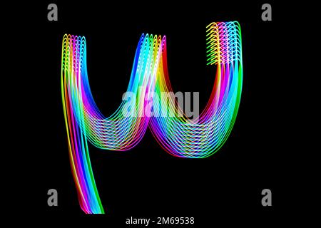 Beautiful light painting designs on dark black background. Long ...