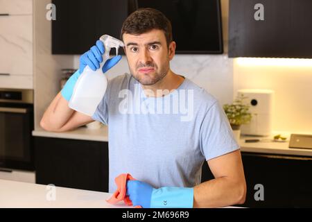 Lazy man with housework duties Stock Photo - Alamy