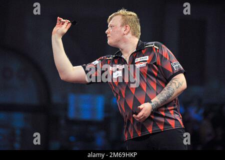 Adam Gawlas in action on day six of the Paddy Power World Darts ...