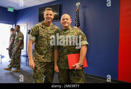U.S. Marine Col. Kevin R. Korpinen (left), the outgoing commanding ...