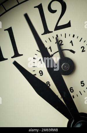 yellow clock face midday 12 o'clock the clock strikes twelve 12 ...