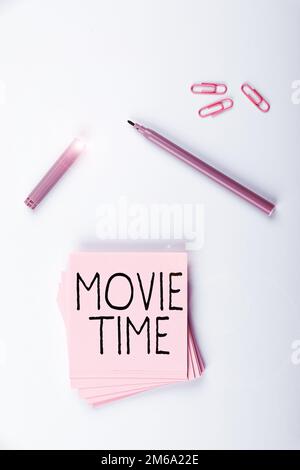 Inspiration showing sign Movie Time. Business approach the scheduled or ...