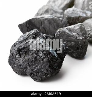 Black coal lumps isolated on white background. Fossil fuel, air ...