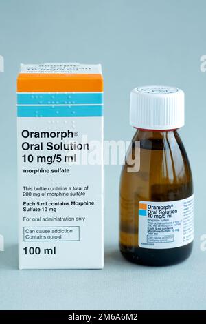 A bottle of Oramorph oral solution morphine sulfate on a white ...