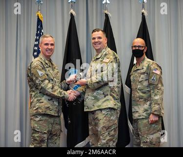 Lt. Gen. Stephen Whiting, left, Space Operations Command commander ...