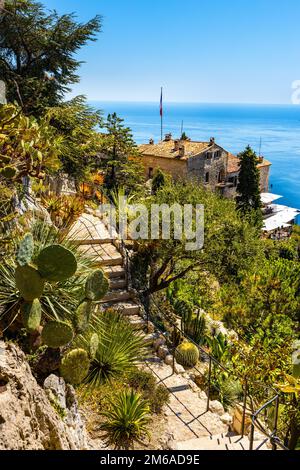 Eze, France - August 1, 2022: Chateau Eza hotel on slope of medieval ...