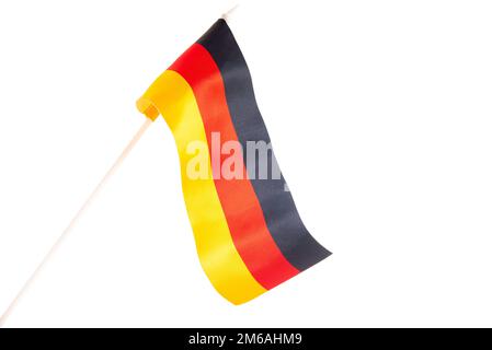 Isolate White flag on a flagpole fluttering in the wind on a blue ...