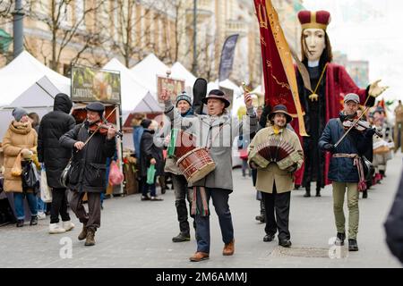 VILNIUS, LITHUANIA - MARCH 4, 2022: Cheerful people participating in ...