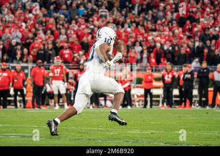 Penn State running back Nicholas Singleton (10) runs with the ball ...