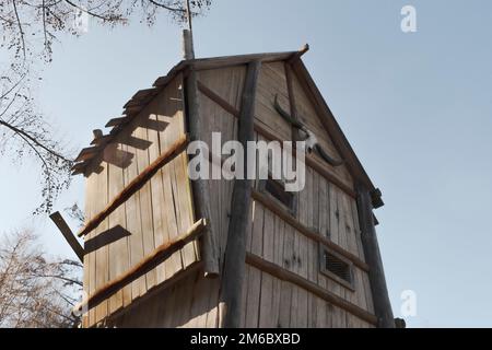 Imitation of the decor of an old hunting wooden house Stock Photo - Alamy