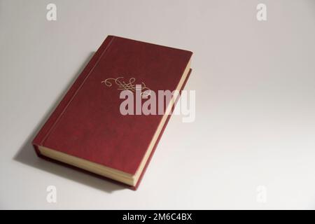 An old book with no title. Ornament or monogram and free space for ...