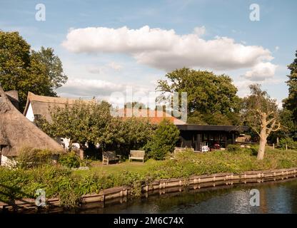 riverside view of national trust location at flatford mill in suffolk ...