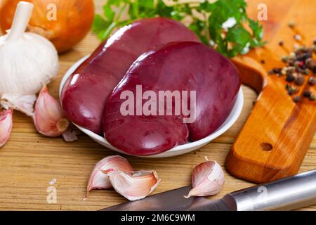 Fresh raw pork kidney with spices on white background Stock Photo - Alamy