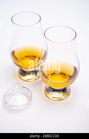 Tulip-shaped tasting glass with dram of Scotch single malt or blended ...
