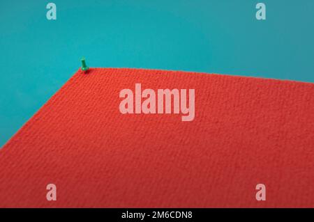 The red carpet is attached with push pins to the wall. Texture. Space ...