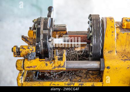 iron pipe beveling machine. Technician is Grooved Steel pipe. Fire ...