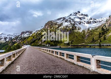 On the dam of Fedaia Lake Stock Photo - Alamy
