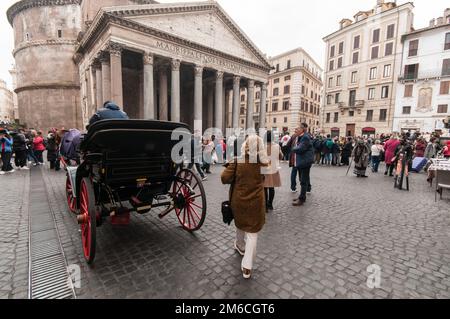 Rome, Italy. 3rd Jan, 2023. A journalist films people leaving St. Peter ...