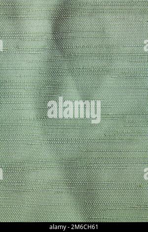 Texture of green fabric made of polyester Stock Photo - Alamy