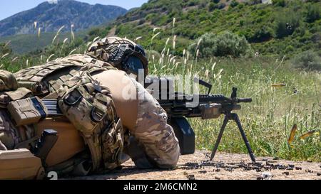 U.S. Army Green Berets assigned to 10th Special Forces Group (Airborne) conduct combat dives ...