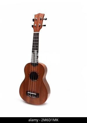 The brown ukulele guitar Stock Photo - Alamy